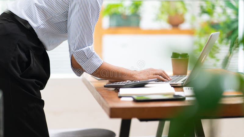 Hands Close Up Freelancer Busy Working on a Laptop Computer on Desktop ...