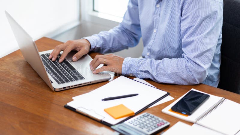 Hands Close Up Freelancer Busy Working on a Laptop Computer on Desktop ...
