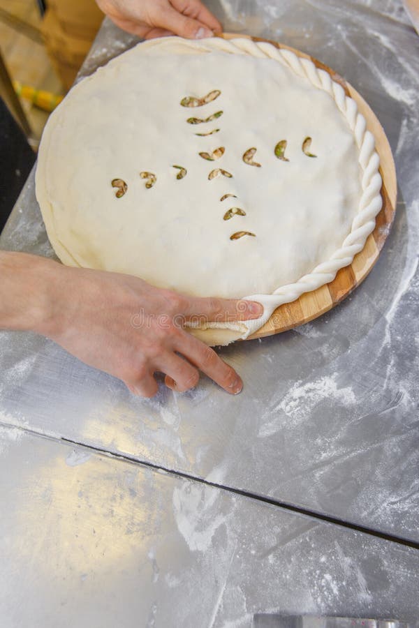 Hands Closing the Ossetian Pie Stuffed with Minced Meat Stock Photo ...
