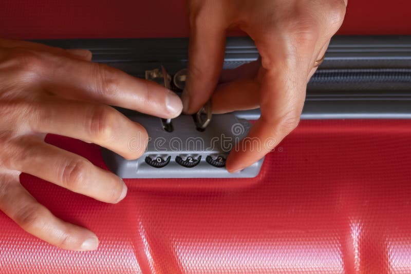 Hands Closing a Padlock with Combination 022 Stock Image - Image of ...