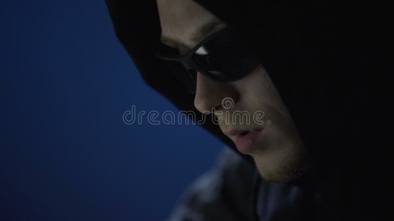 Hands of Computer Hacker in Black Gloves Typing on Laptop To Hack ...