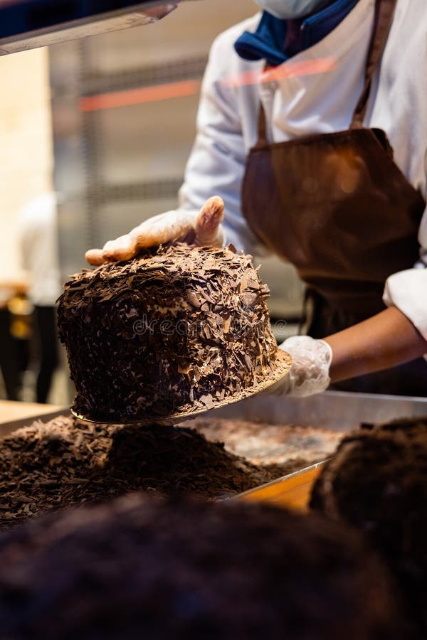 A Hands of Confectioner-chocolatier during at Work. the Making of Cake ...