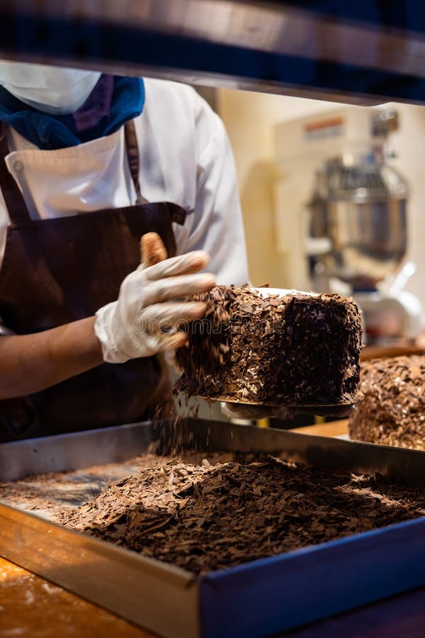 A Hands of Confectioner-chocolatier during at Work. the Making of Cake ...