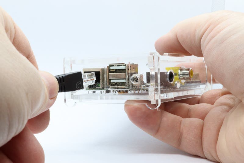 Hands Connecting a Computer Network Cable To a Mini PC Stock Image ...