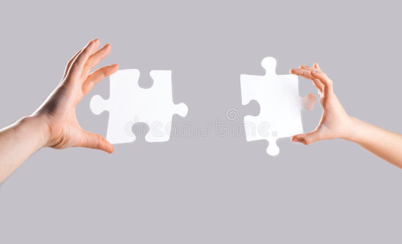 Hands Connecting Puzzle. Puzzles. Hand of the Child and Hand of Mother ...