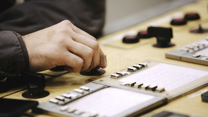 Hands on the control panel stock video. Video of plant - 314909891