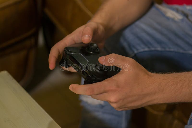 Hands are Controlling a Joystick for a Game Stock Photo - Image of ...
