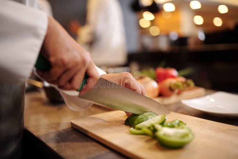 Cook Chopping Bell Pepper stock photo. Image of meal - 287237294