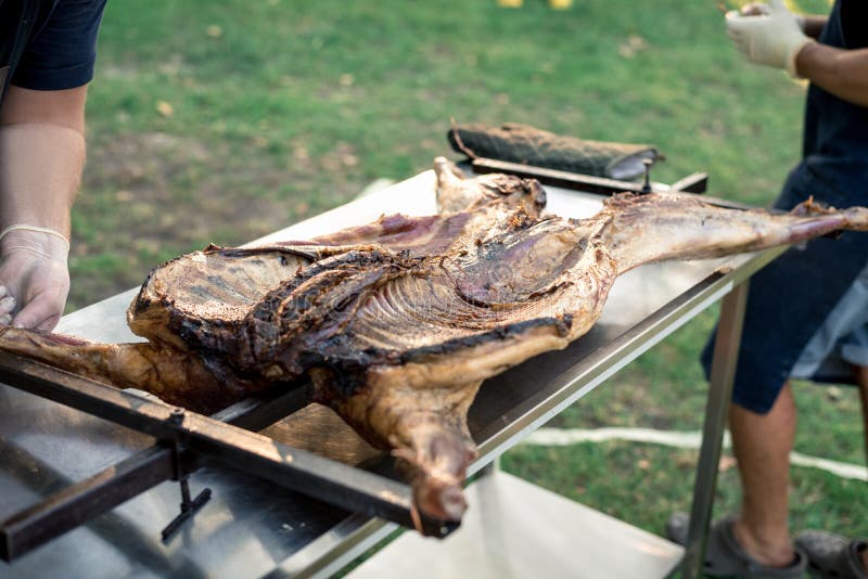 The Hands of the Cook Cut the Greased Carcass of the Rabbit Stock Image ...