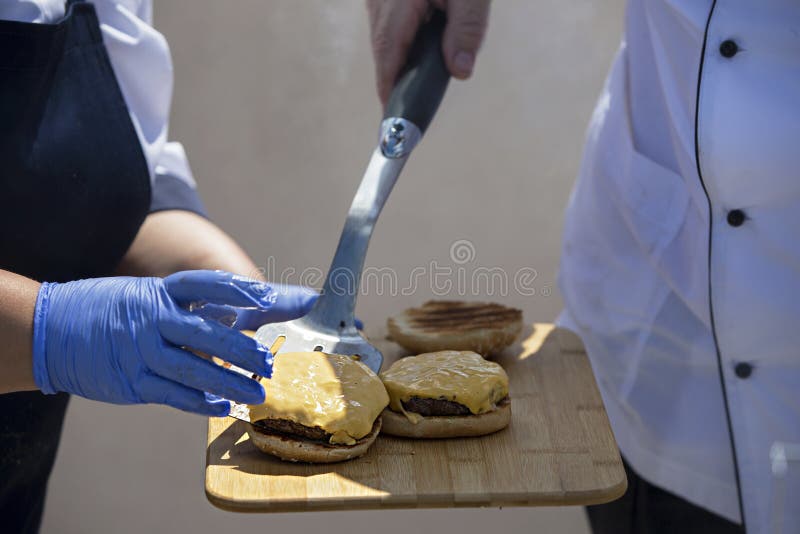 The Hands of the Cook Make a Hamburger Stock Image - Image of ...