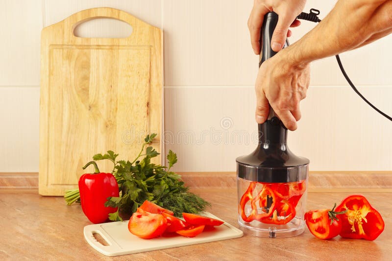 Hands Cooks are Going To Chop Red Pepper in Blender Stock Image - Image ...