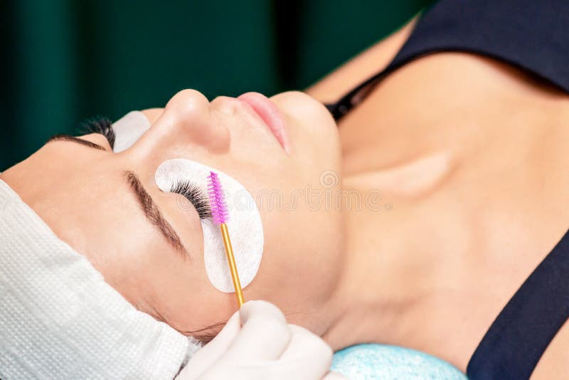Hands of Cosmetologist Using Eyelash Brush Stock Photo - Image of ...