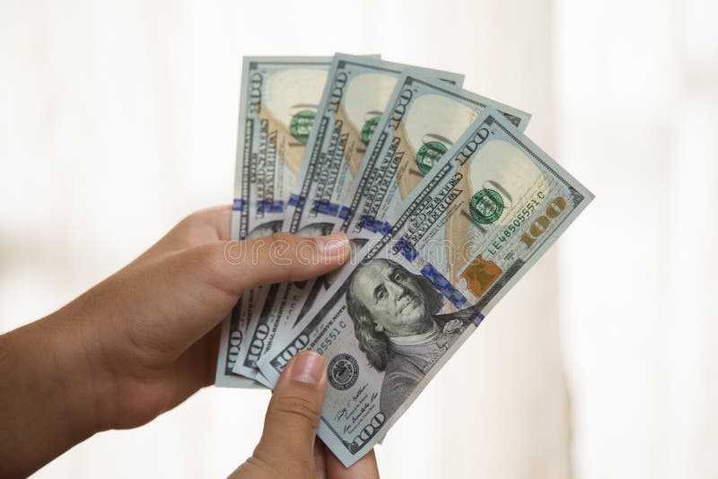 Hands counting dollars. stock photo. Image of concepts - 51169380