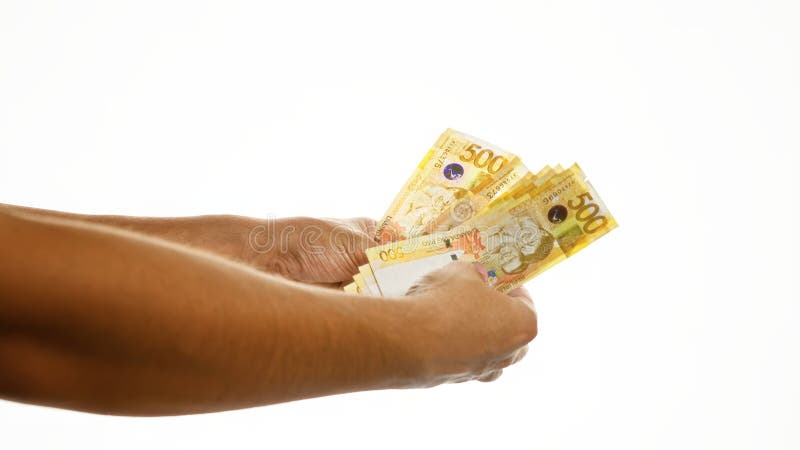 Hands Counting Philippine Pesos Over Isolated White Background Stock ...
