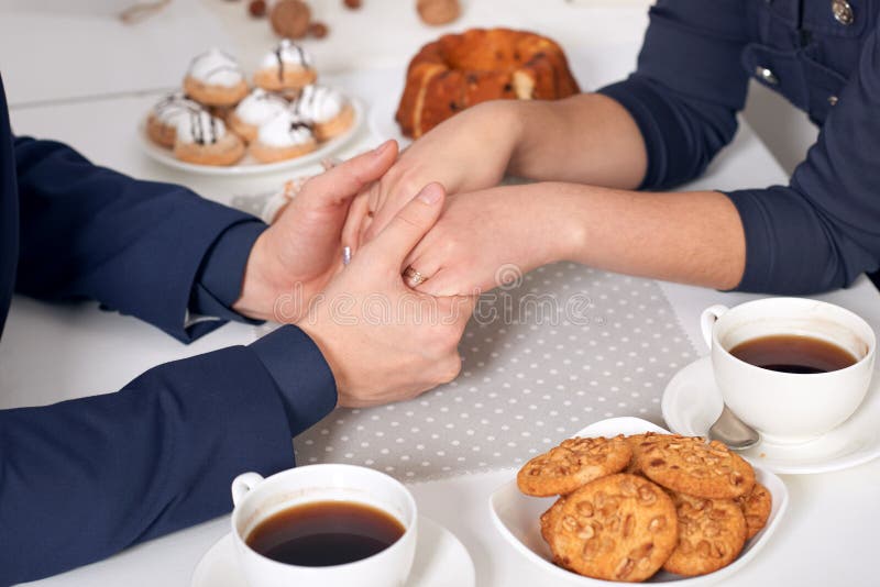 Hands of Couple Drinking Tea in the Room Stock Photo - Image of people ...