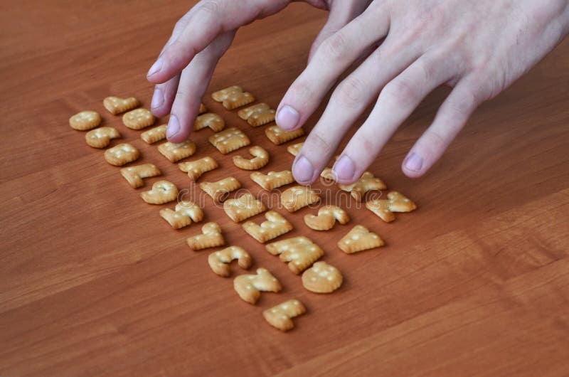 Hands on Cracker Keyboard Buttons Stock Photo - Image of baked, dessert ...