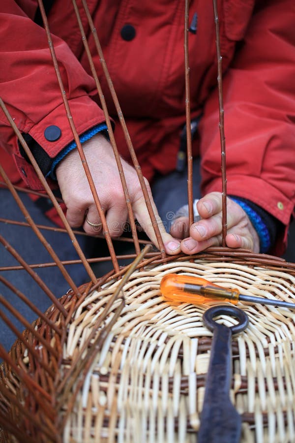 Hands of a Craftsman Working on a Wicker Basket Stock Image - Image of ...