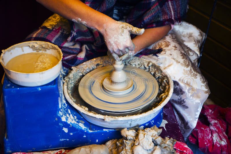 Hands Create the Shape of a Clay Product. Work with Fingers on Modeling ...