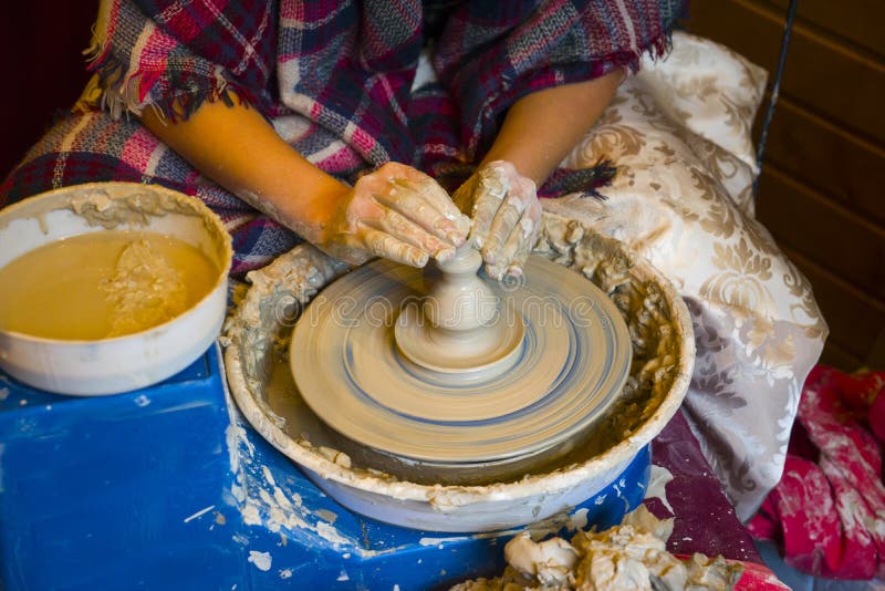 Hands Create the Shape of a Clay Product. Work with Fingers on Modeling ...