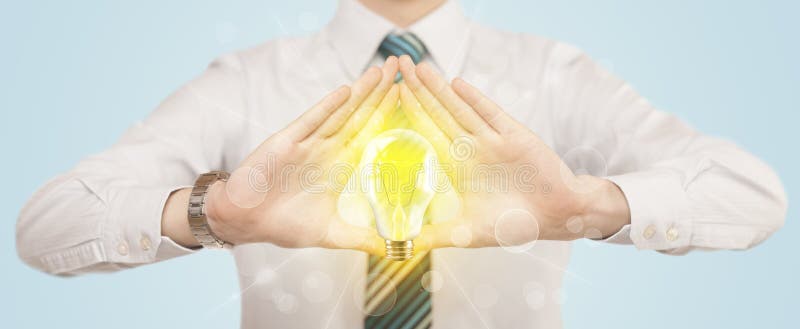 Hands Creating a Form with Light Bulb Stock Image - Image of decision ...
