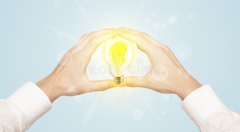 Hands Creating a Form with Light Bulb Stock Photo - Image of concept ...