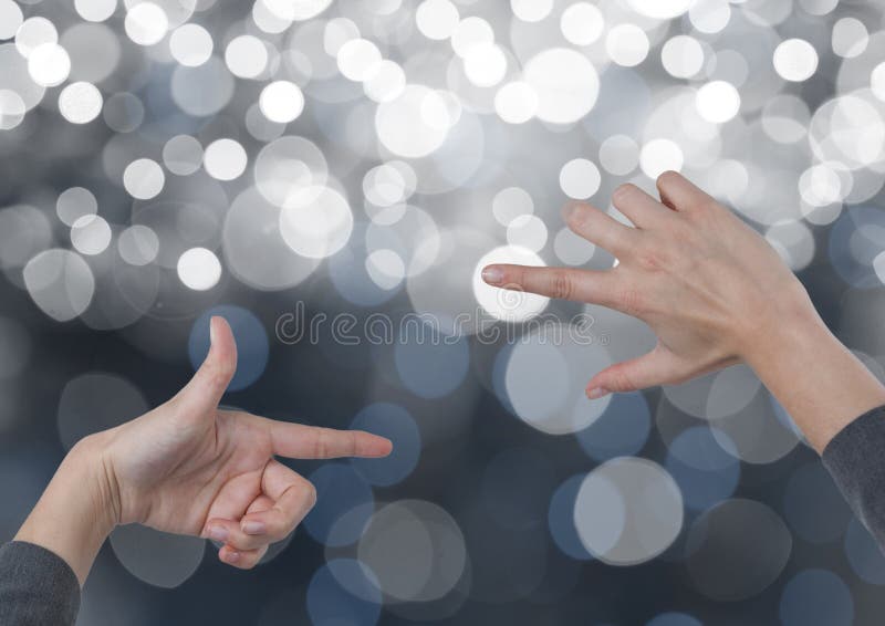 Hands Creating Rectangle Invisible Shape with Sparkling Light Bokeh ...