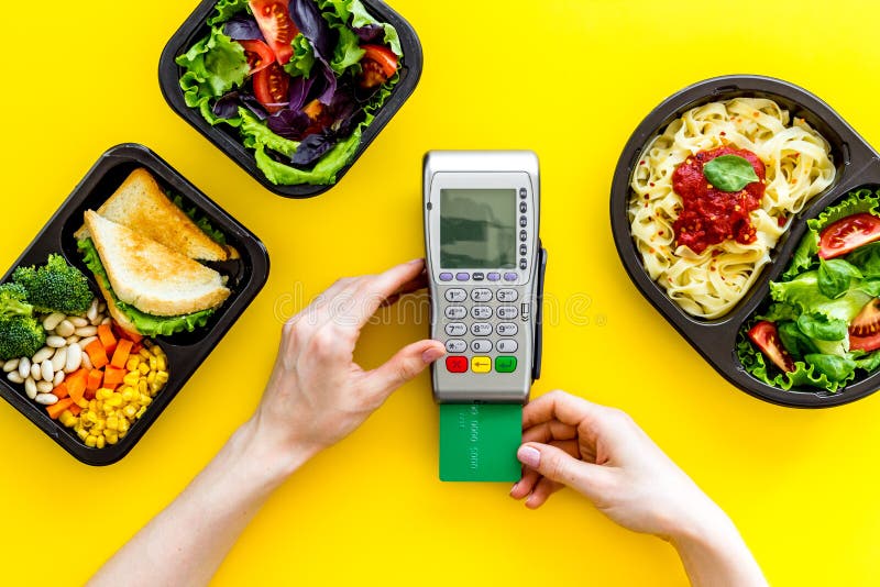 Hands with Credit Card and Payment Terminal. Restaurant Food Delivery ... Hands with Credit Card and Payment Terminal. Restaurant Food Delivery ...
