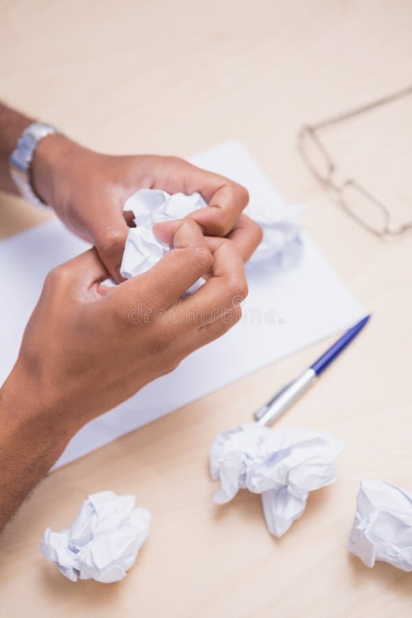 Hands Crumpling Papers on Desk Stock Photo - Image of messy, paper ...