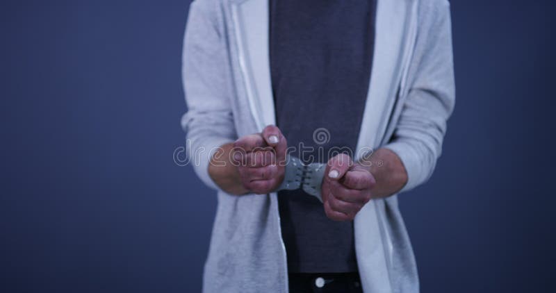 Hands, Cuffs and Closeup of Man Prisoner in Studio for Illegal Crime ...
