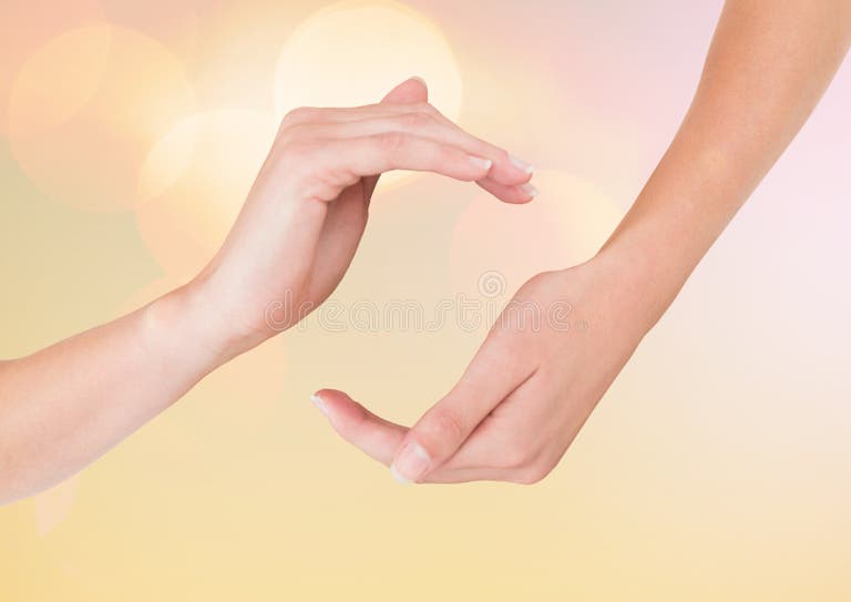 Hands in Curved Posture with Sparkling Light Bokeh Background Stock ...