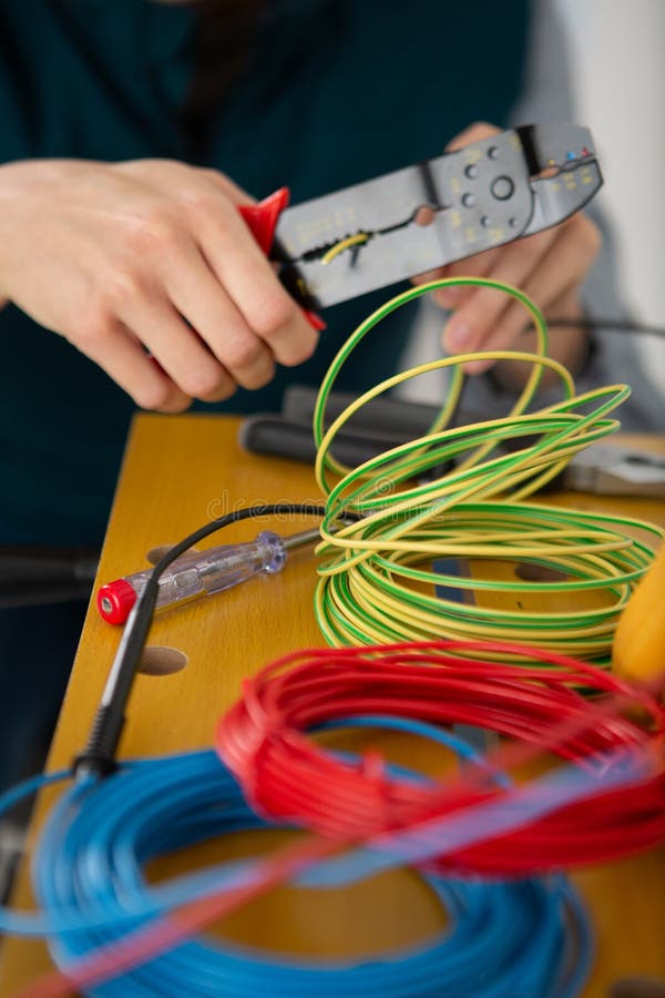 Hands Cutting Cable with Pliers Stock Photo - Image of cropped ...