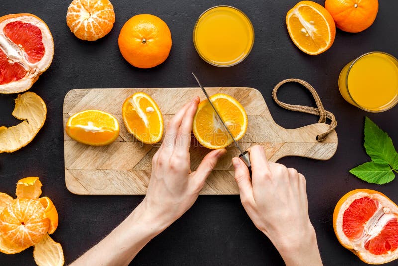 Hands Cutting Citrus Fruit Top View, Top View Stock Photo - Image of ...