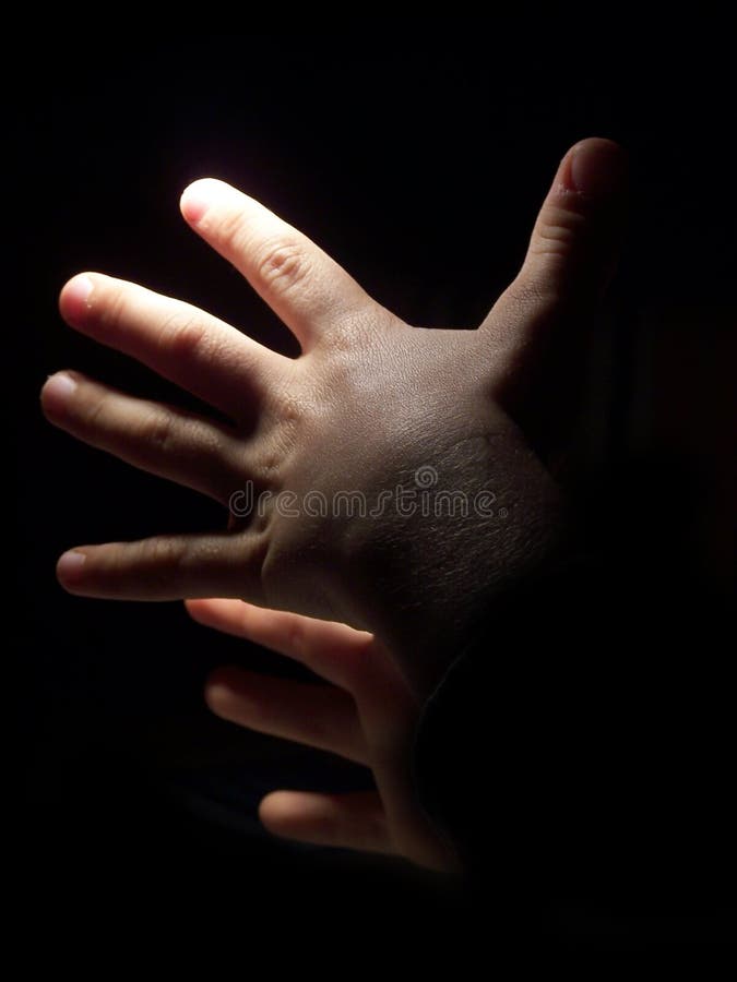 Hands in Dark stock image. Image of fingers, prying, conducting - 17034421