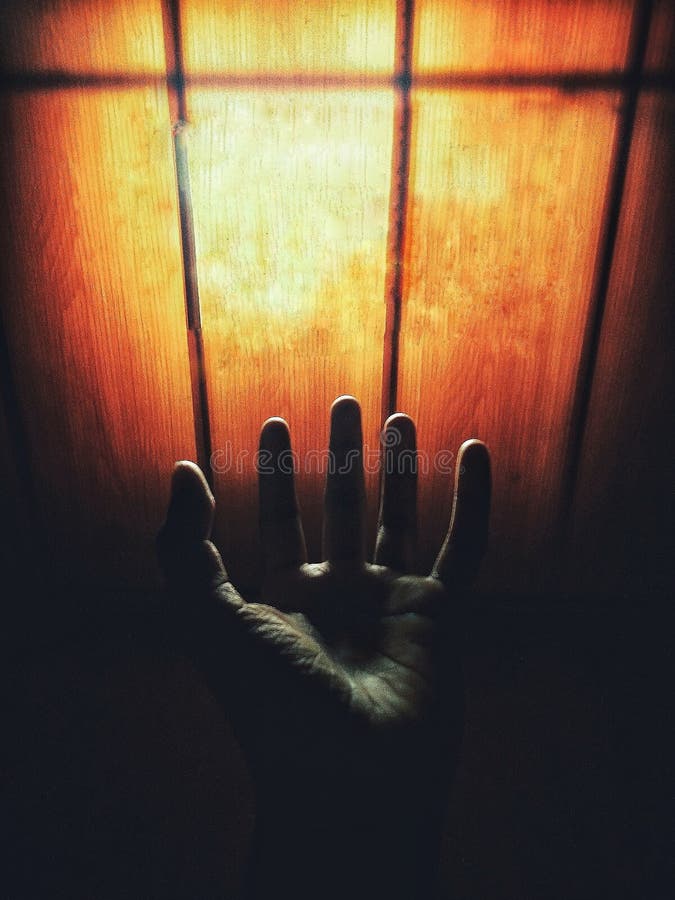 Hands in dark lighting stock photo. Image of lighting - 192199712