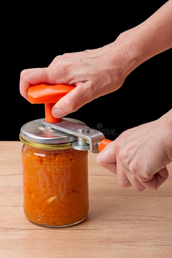 Hands with a Device for Closing Cans Stock Photo - Image of device ...