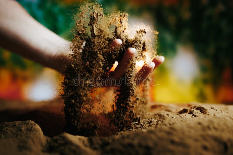 Hands Digging into Soil while Playing with Earth Under Colorful ...