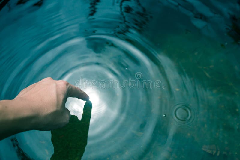 The Hands Dipped in Blue Water until. Stock Photo - Image of drop, blue ...