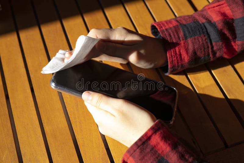 Hands Disinfecting the Mobile with a Wipe Stock Image - Image of ...