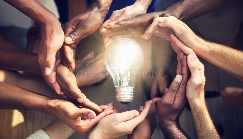 Hands of Diverse Individuals Encircle a Glowing Light Bulb, Symbolizing ...