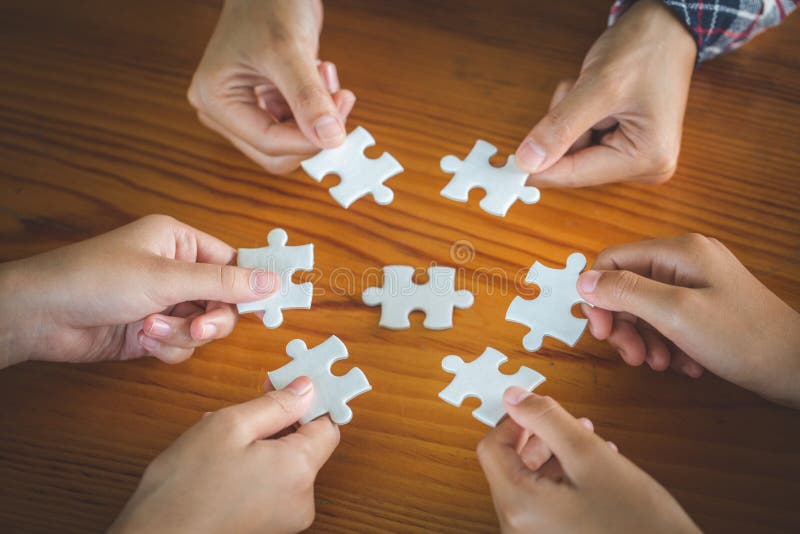 Hands of Diverse People Assembling Jigsaw Puzzle, Youth Team Put Stock ... Hands of Diverse People Assembling Jigsaw Puzzle, Youth Team Put Stock ...