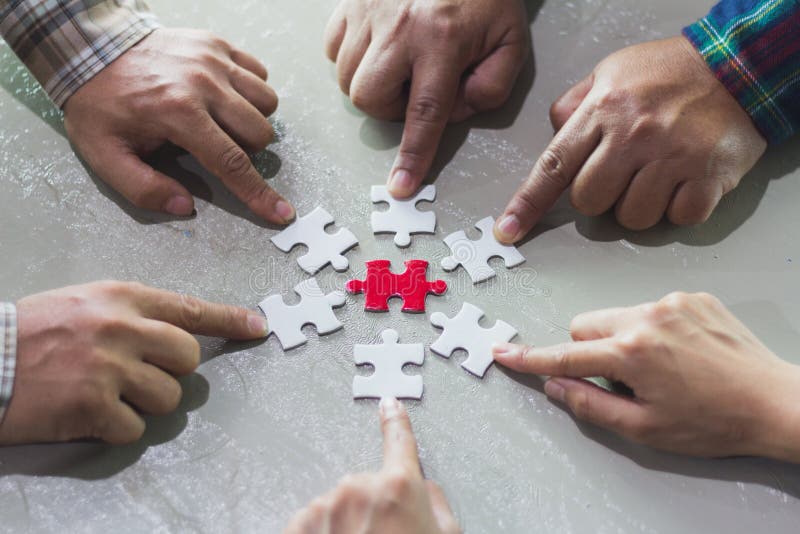 Hands of Diverse People Assembling Jigsaw Puzzle, Youth Team Put Stock ... Hands of Diverse People Assembling Jigsaw Puzzle, Youth Team Put Stock ...