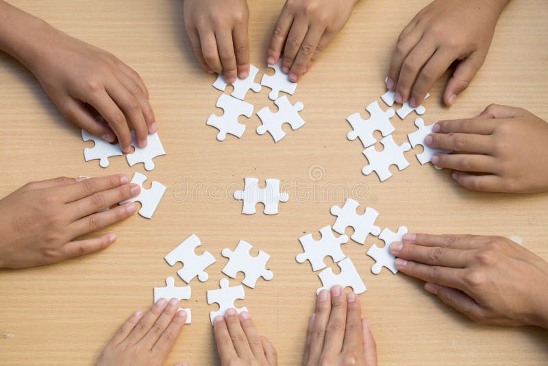 Hands of Diverse People Assembling Jigsaw Puzzle, Youth Team Put Stock ...