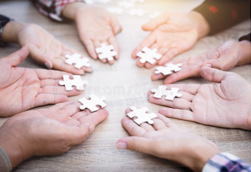 Hands of Diverse People Assembling Jigsaw Puzzle, Youth Team Put Pieces ...