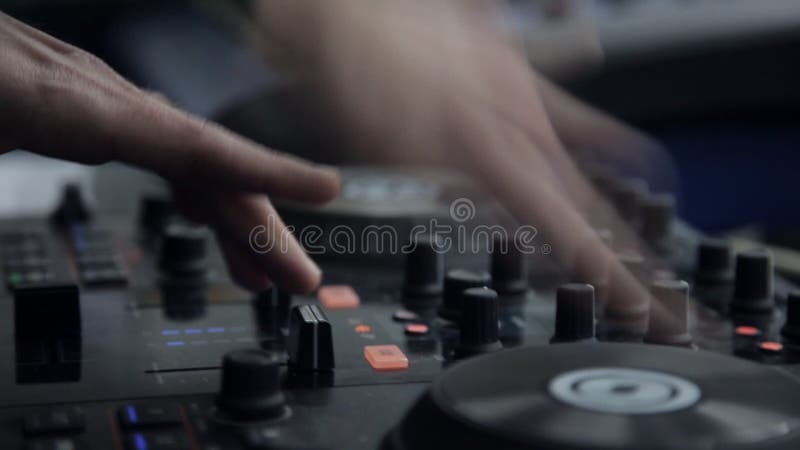 DJ Behind the Decks and the Artist on Stage at a Stock Video - Video of ...