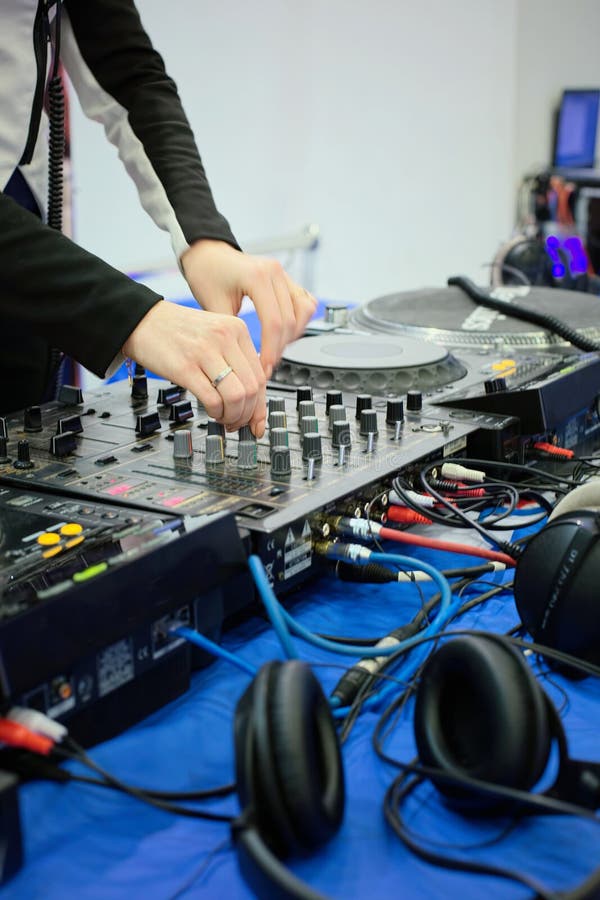 Dj Hands On Equipment Deck And Mixer With Vinyl Record At Party. Stock ...