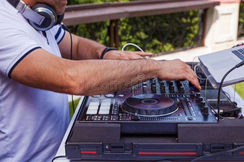 The hands of the DJ stock photo. Image of hands, disco - 122805656