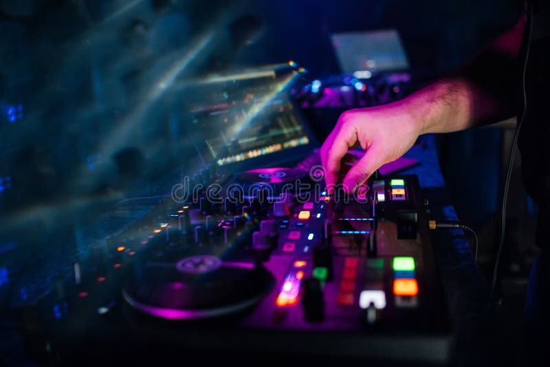 Hands DJ Playing and Mixing Music on Music Controller at a Party Stock ...