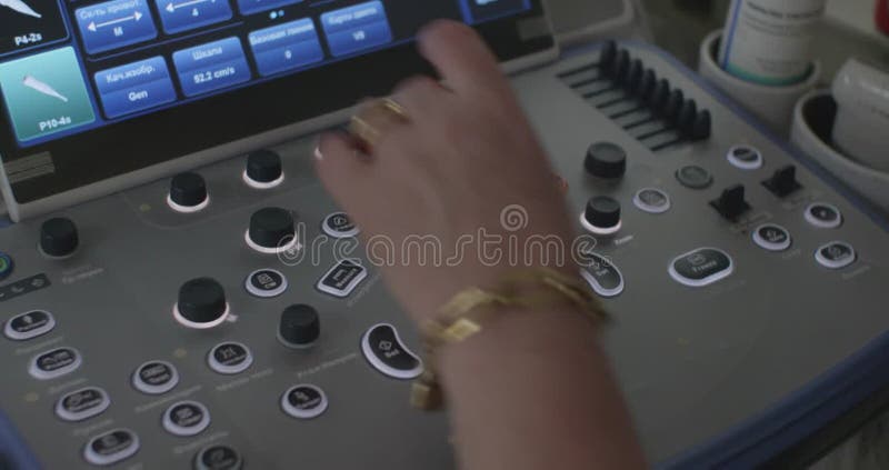 The Hands of the Doctor Control the Settings of the Study on the ...