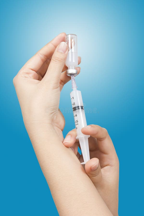 Hands of the Doctors Filling a Syringe Stock Image - Image of hands ...