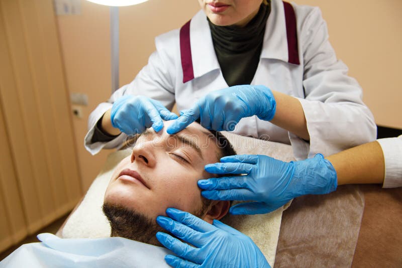 Two doctors and patient. stock image. Image of adult - 109865893